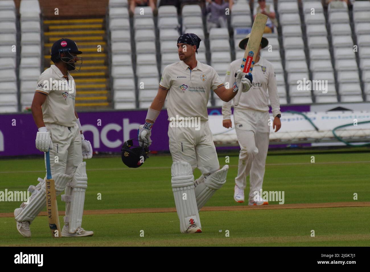 Cricket batsman raising bat hi-res stock photography and images - Alamy