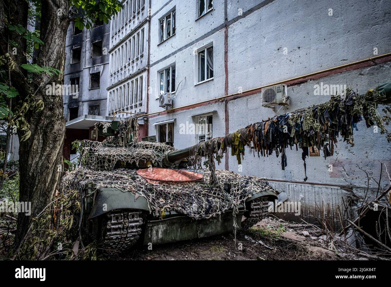 Kharkiv, Ukraine. 07th July, 2022. A Ukrainian tank covered in ...