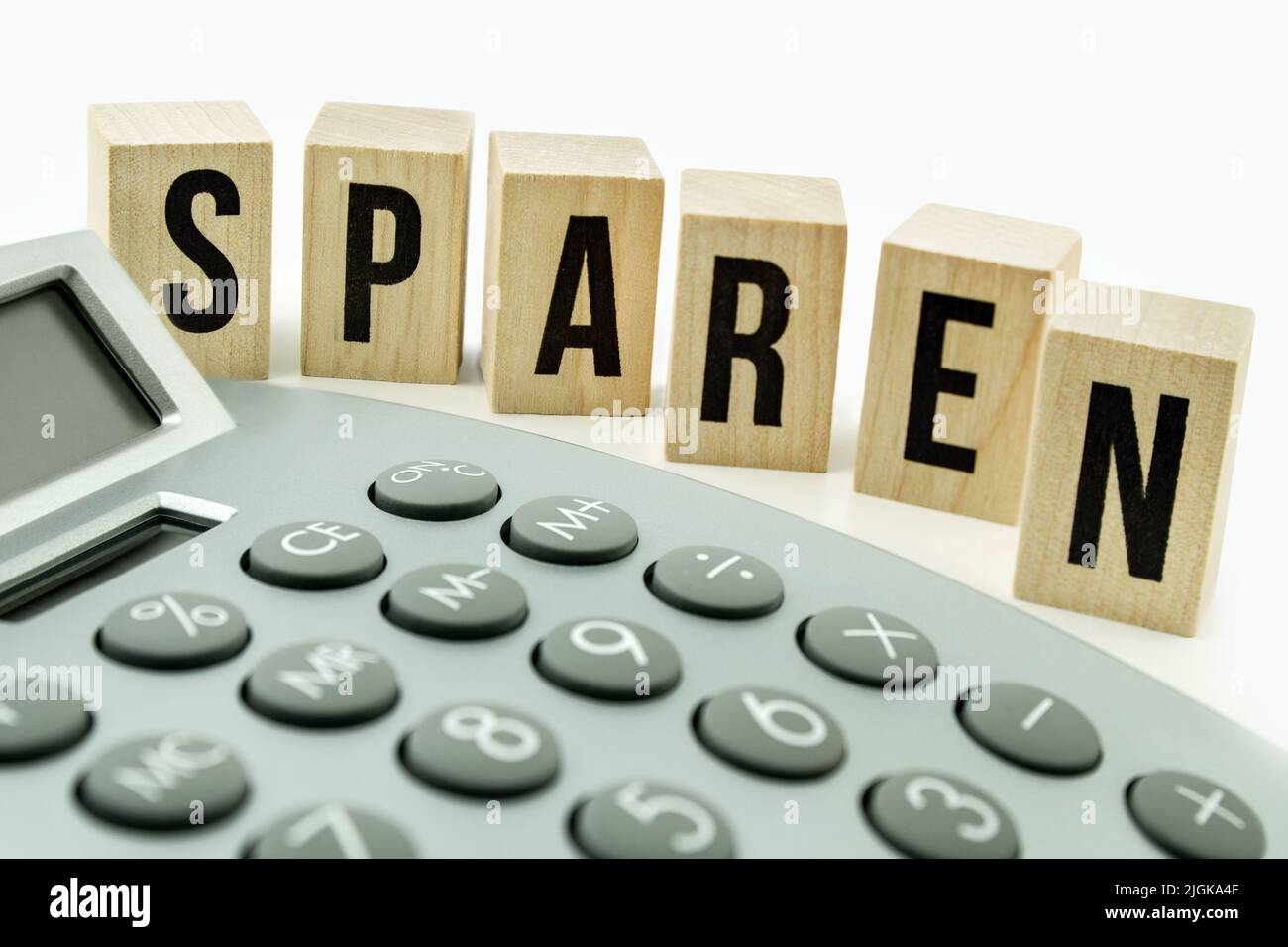 Calculator and German saving on white background Stock Photo - Alamy
