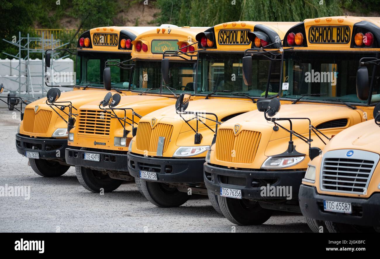 Baltow, Poland - July 1, 2022: Yellow school buses lined up in the ...