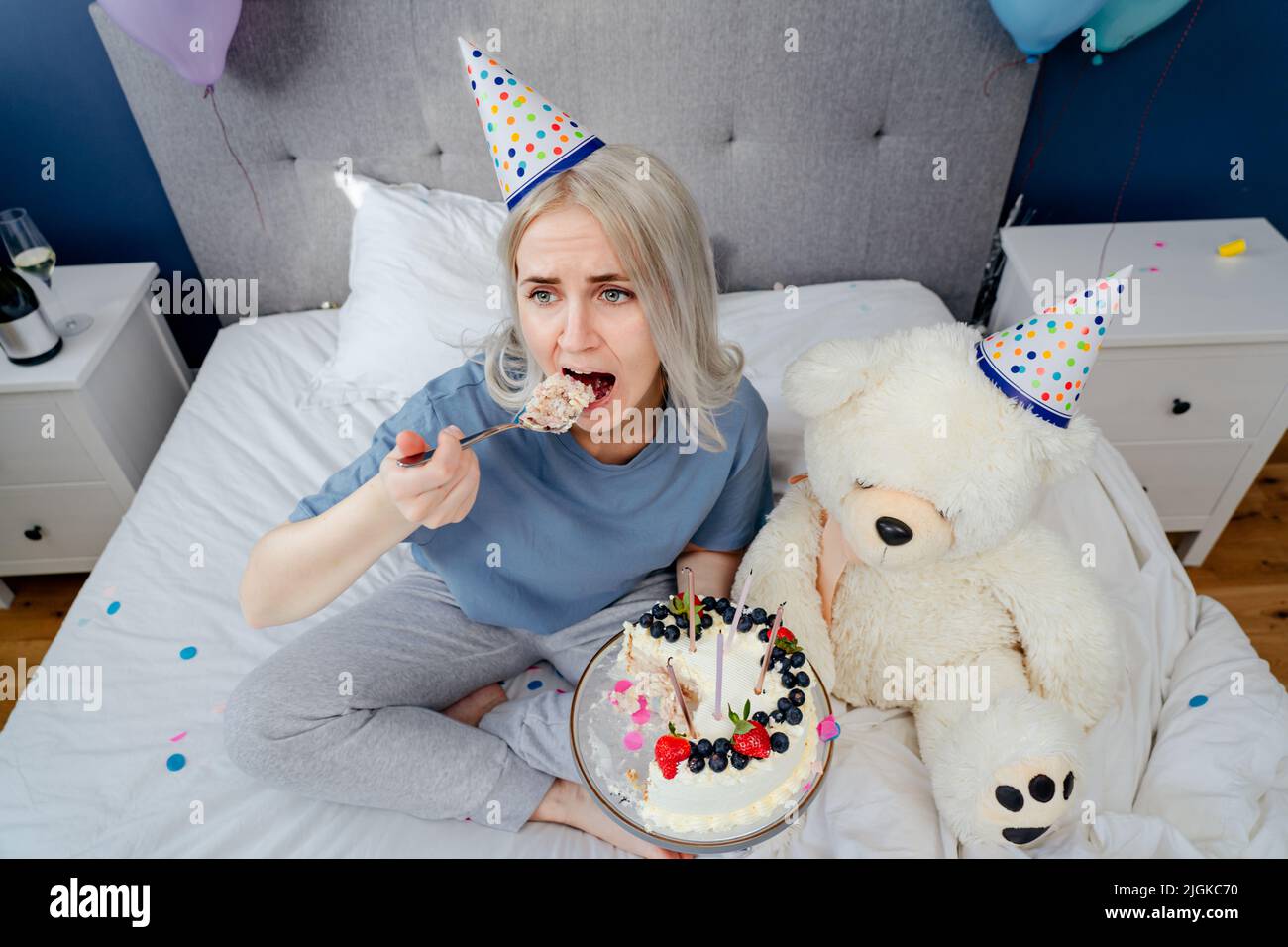 Grumpy woman and cake hi-res stock photography and images - Alamy