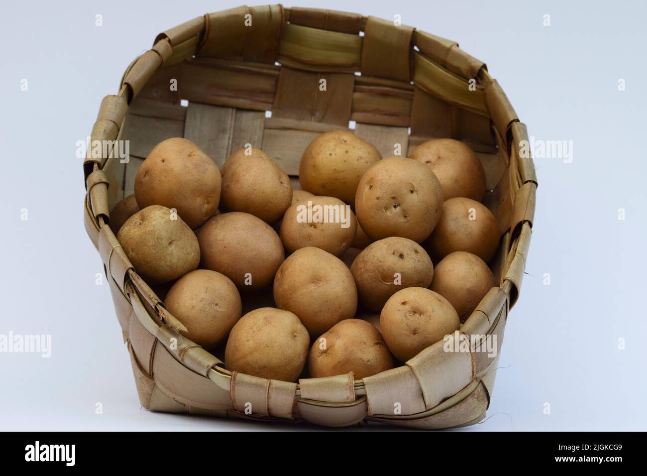 Potatoes in basket. Baby potatoes small round potato from india on ...