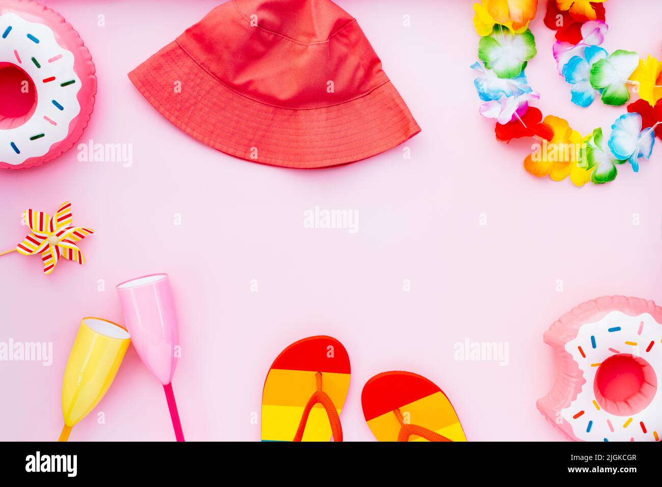 Flat lay of summer vibes concept with colorful pool party items ...