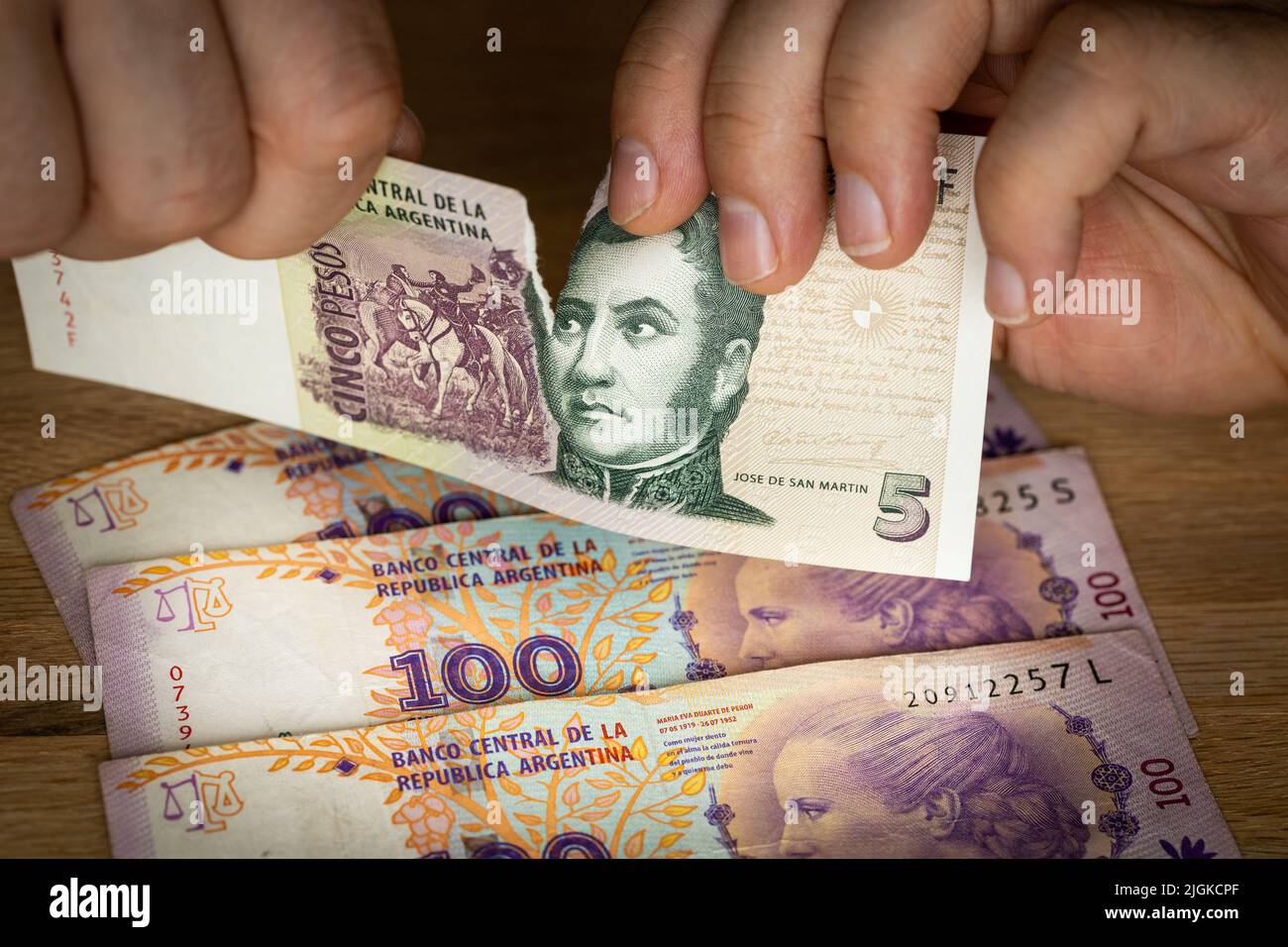 Argentine Peso, Financial Crash, Valuable Currency, Hands Ripping Money ...