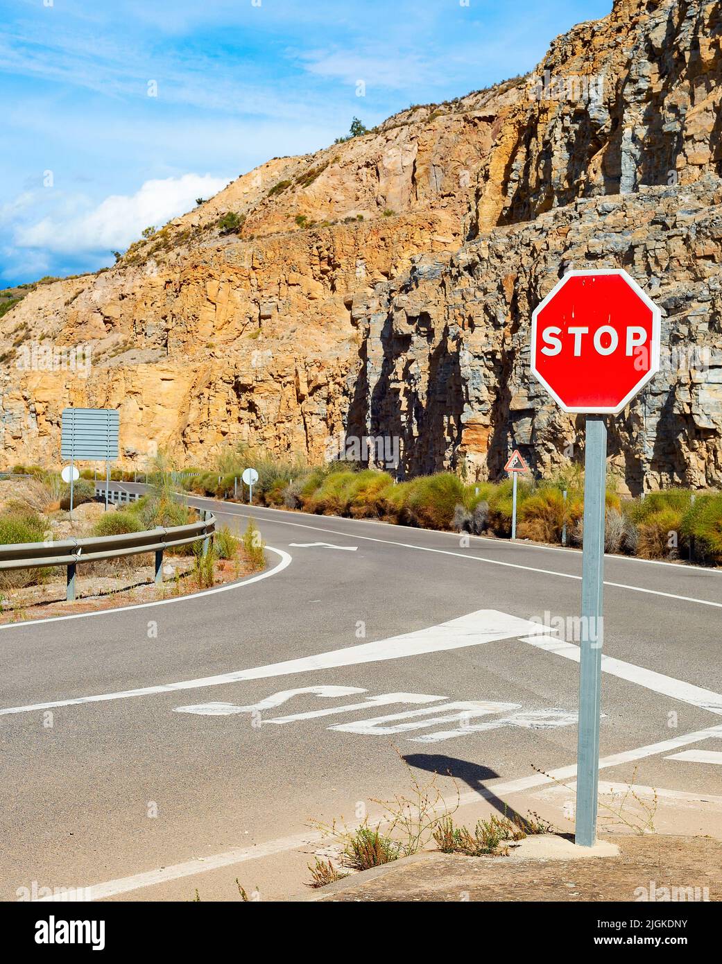 Stop sign on mountain road, sunshine landscape, Spain Stock Photo - Alamy