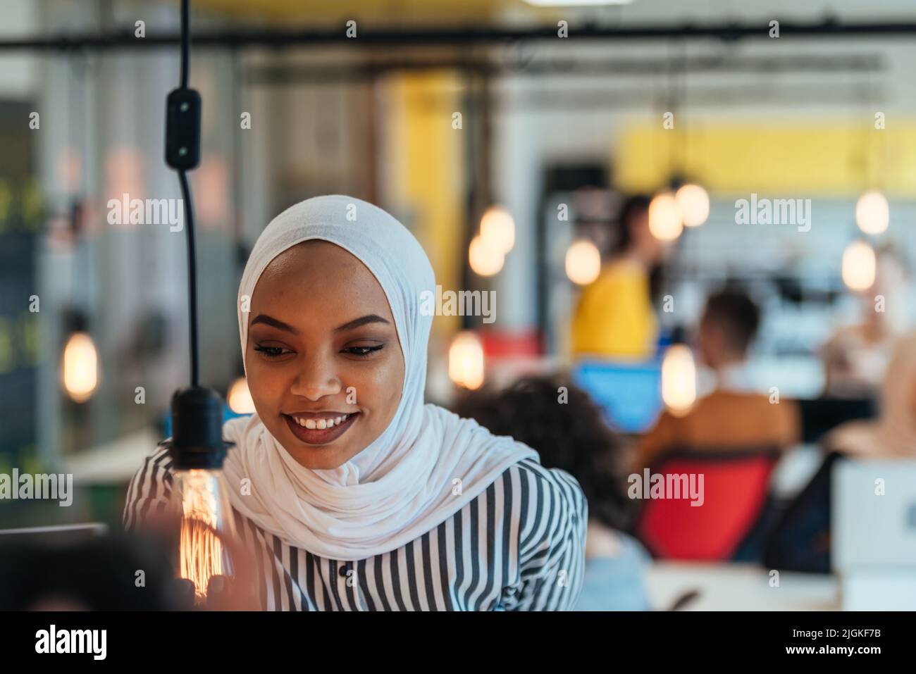 Sentimental portrait of African-American young female Muslim wearing ...