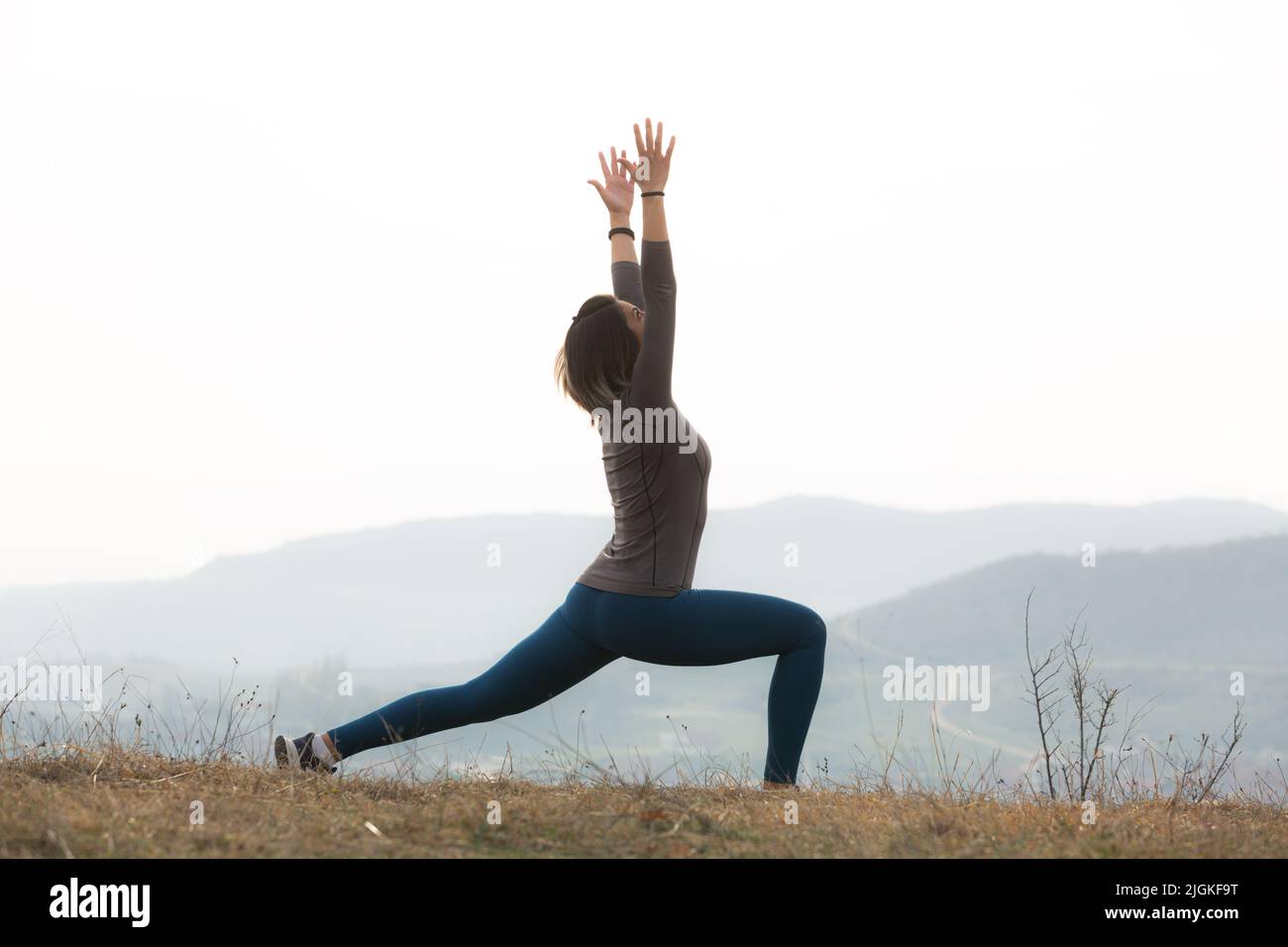 Amazing and active woman is warming up before her training Stock Photo ...