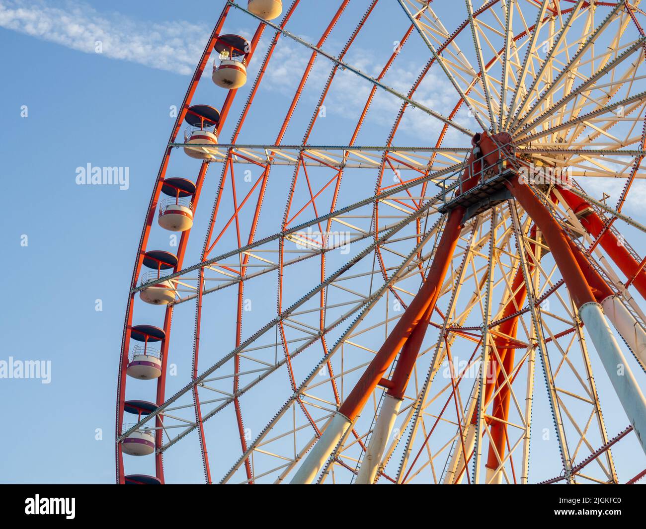 Ferris wheel against the sky. Amusement park by the sea. Rest zone ...