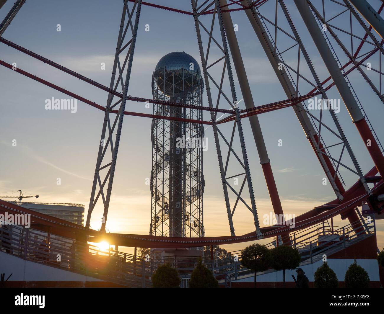 Ferris wheel against the sky. Amusement park by the sea. Rest zone ...