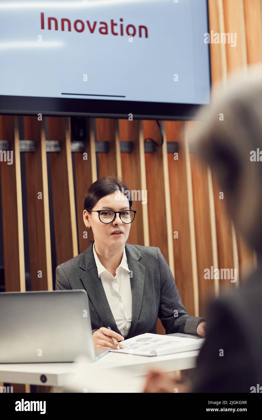 Portrait of content female business speaker of innovation conference ...