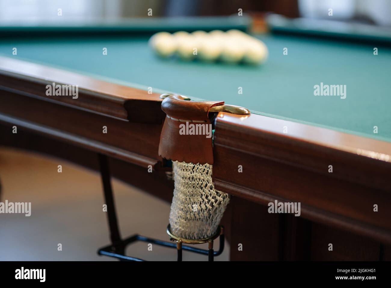 Billiard table with green surface and balls in the billiard club Stock ...