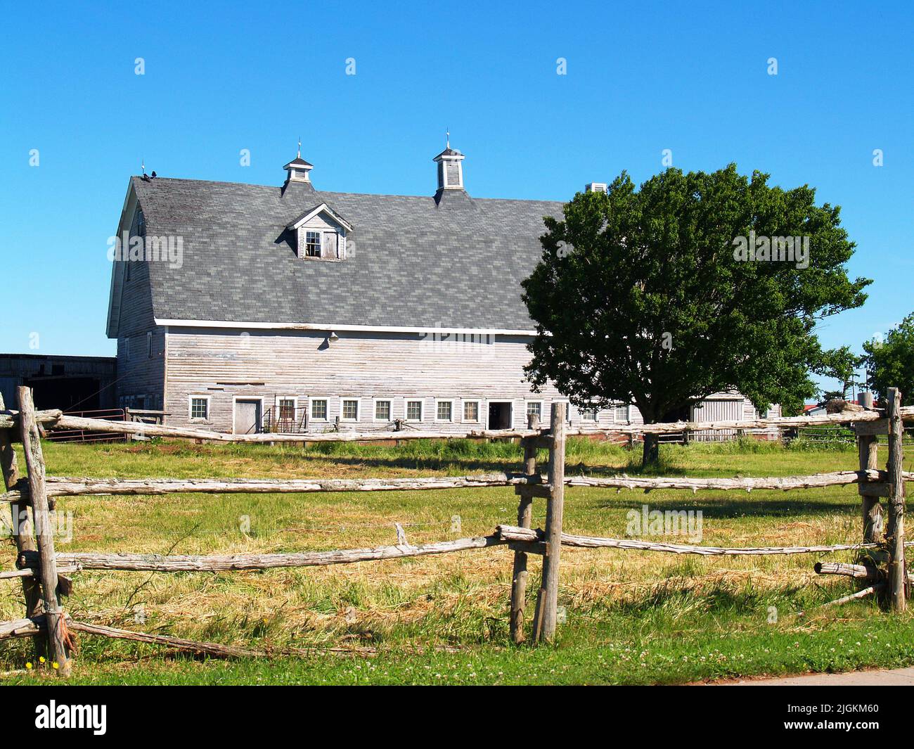 Old barn and fence,PEI Stock Photo - Alamy