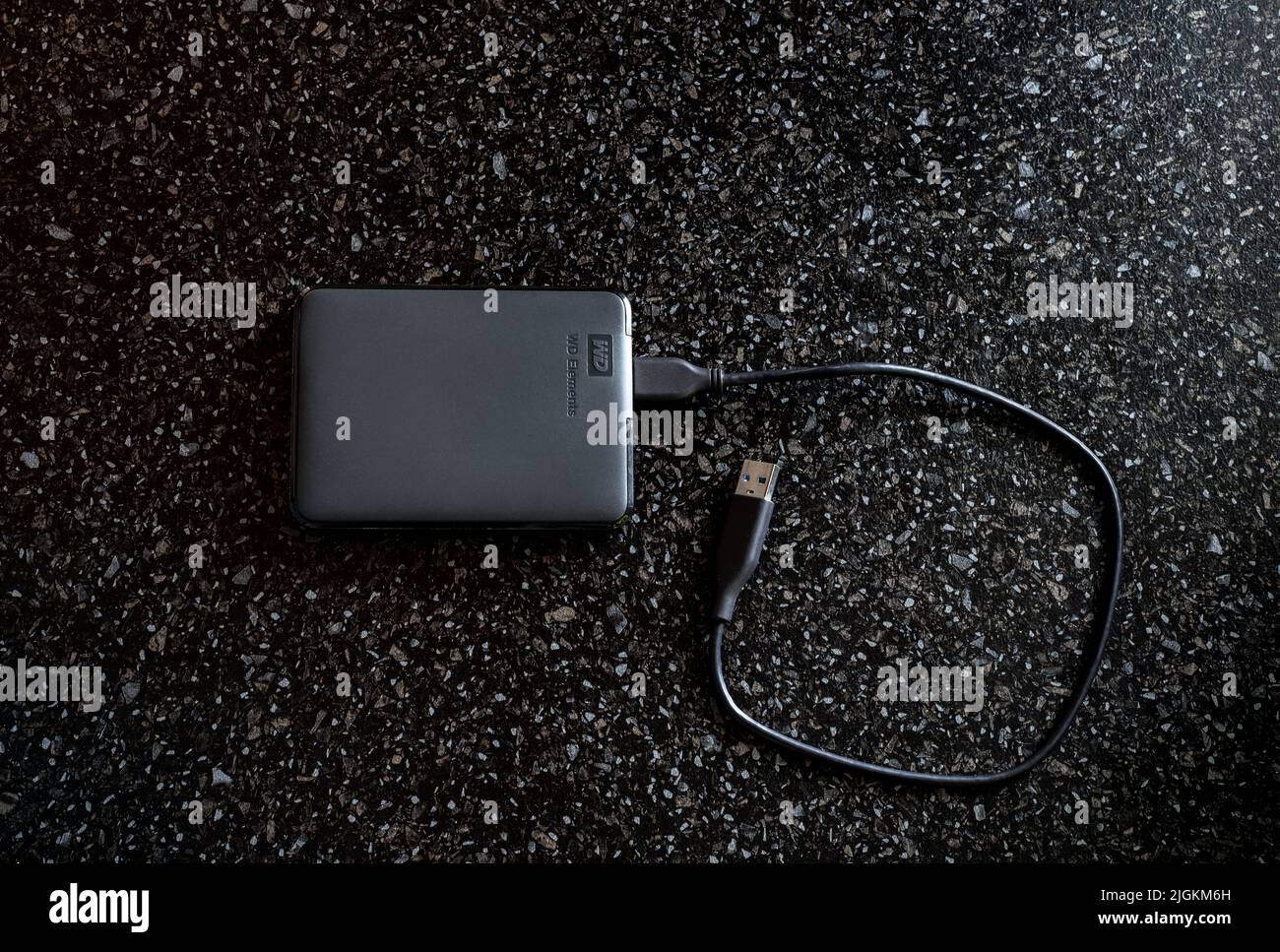 External HDD WD Elements Portable in a black case with a wire on a ...
