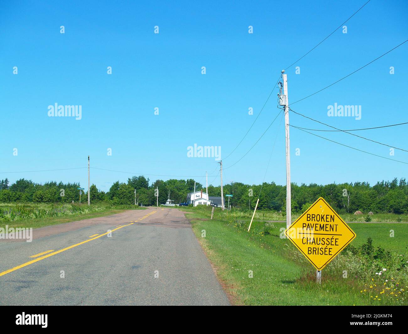 Broken pavement sign, Prince Edward Island Stock Photo - Alamy