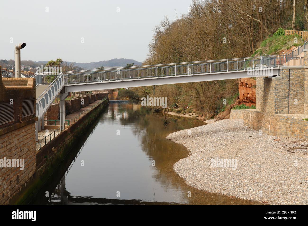 The new Alma Bridge in Sidmouth viewed from the sea, looking inland along the River Sid Stock ...
