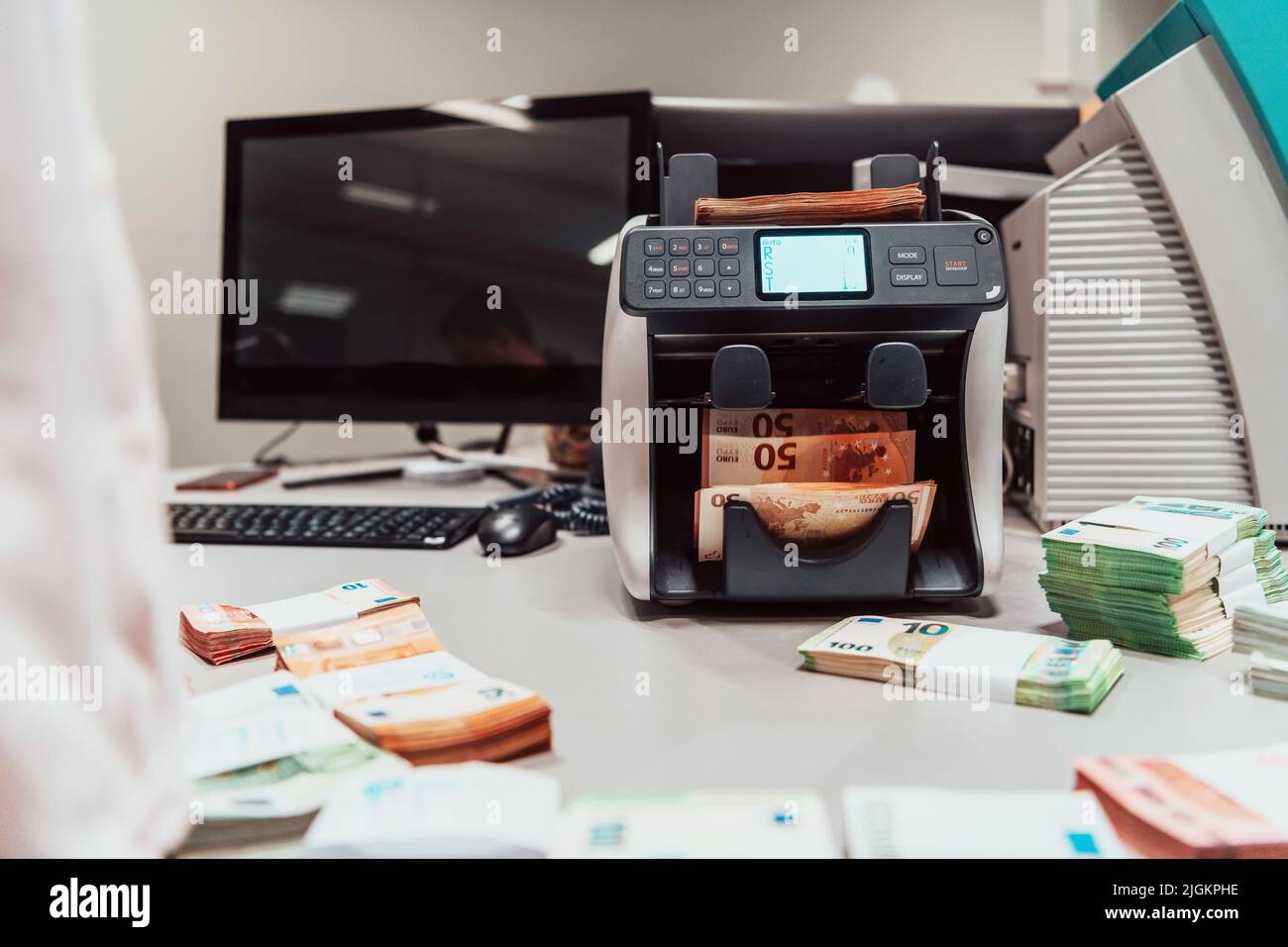 Sorted banknotes placed on the table after it is counted on the ...