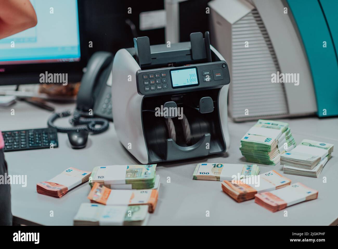 Sorted banknotes placed on the table after it is counted on the ...