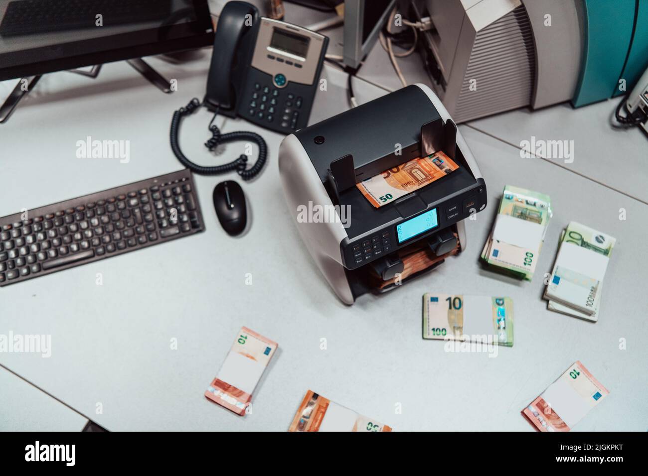 Sorted banknotes placed on the table after it is counted on the ...