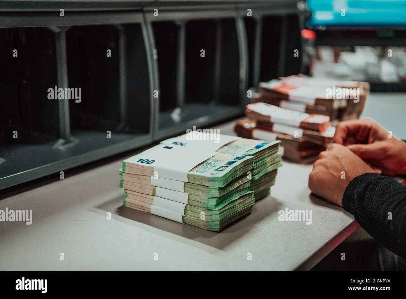 Sorted banknotes placed on the table after it is counted on the ...