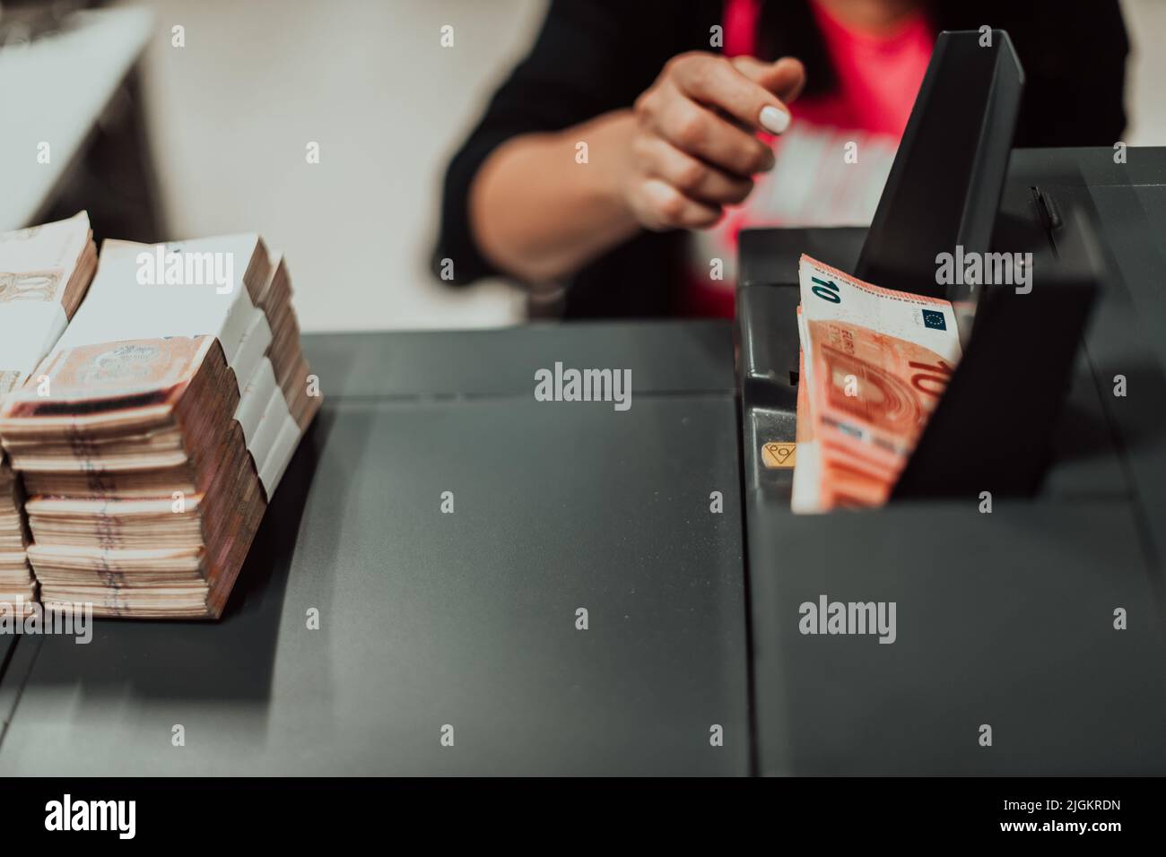 Sorted banknotes placed on the table after it is counted on the ...