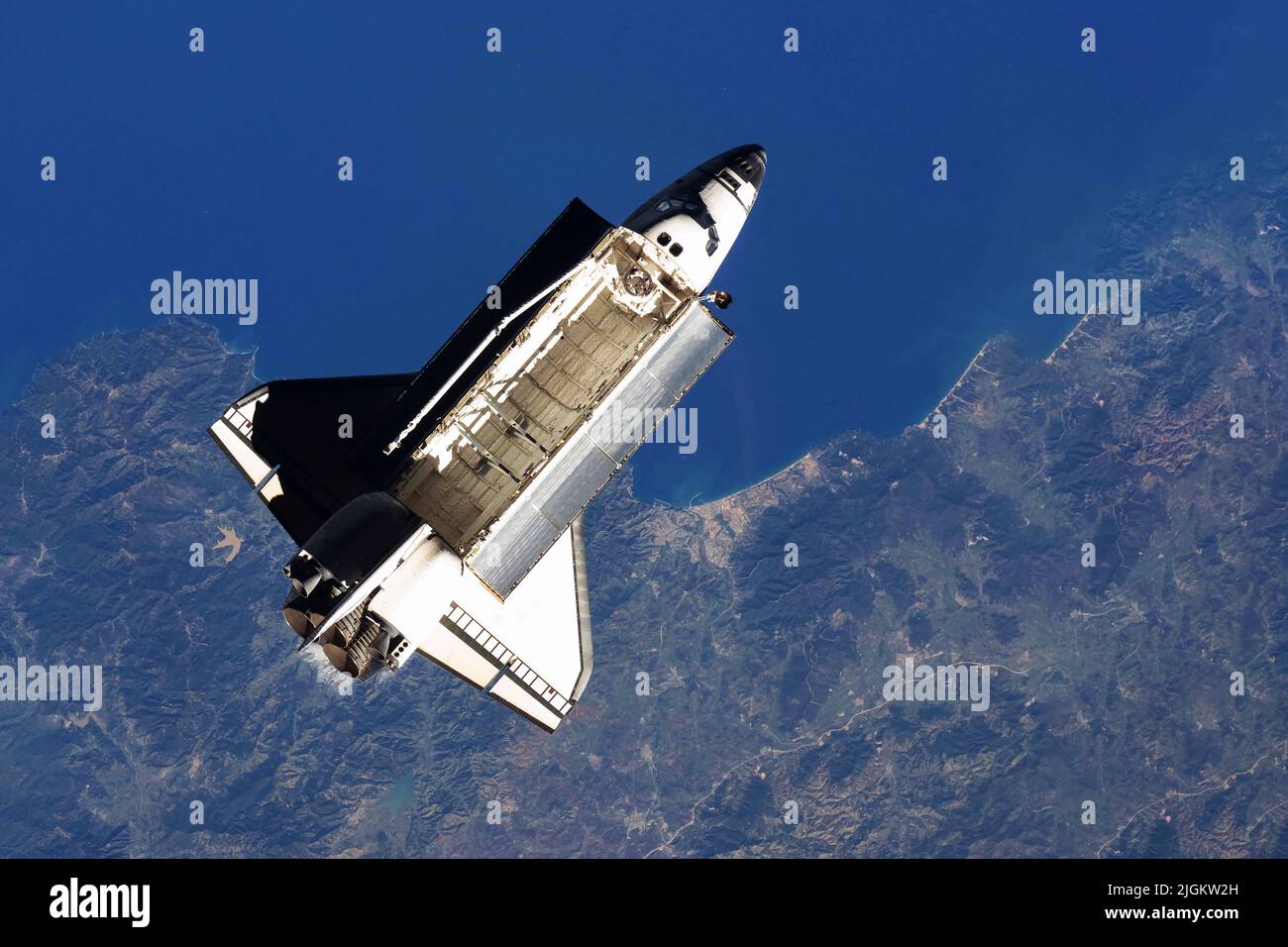Space shuttle, above the Earth. Elements of this image furnished by ...