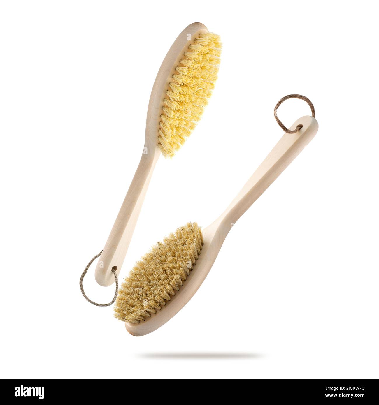 Two body brushes float on a white background. Massage brushes made of ...