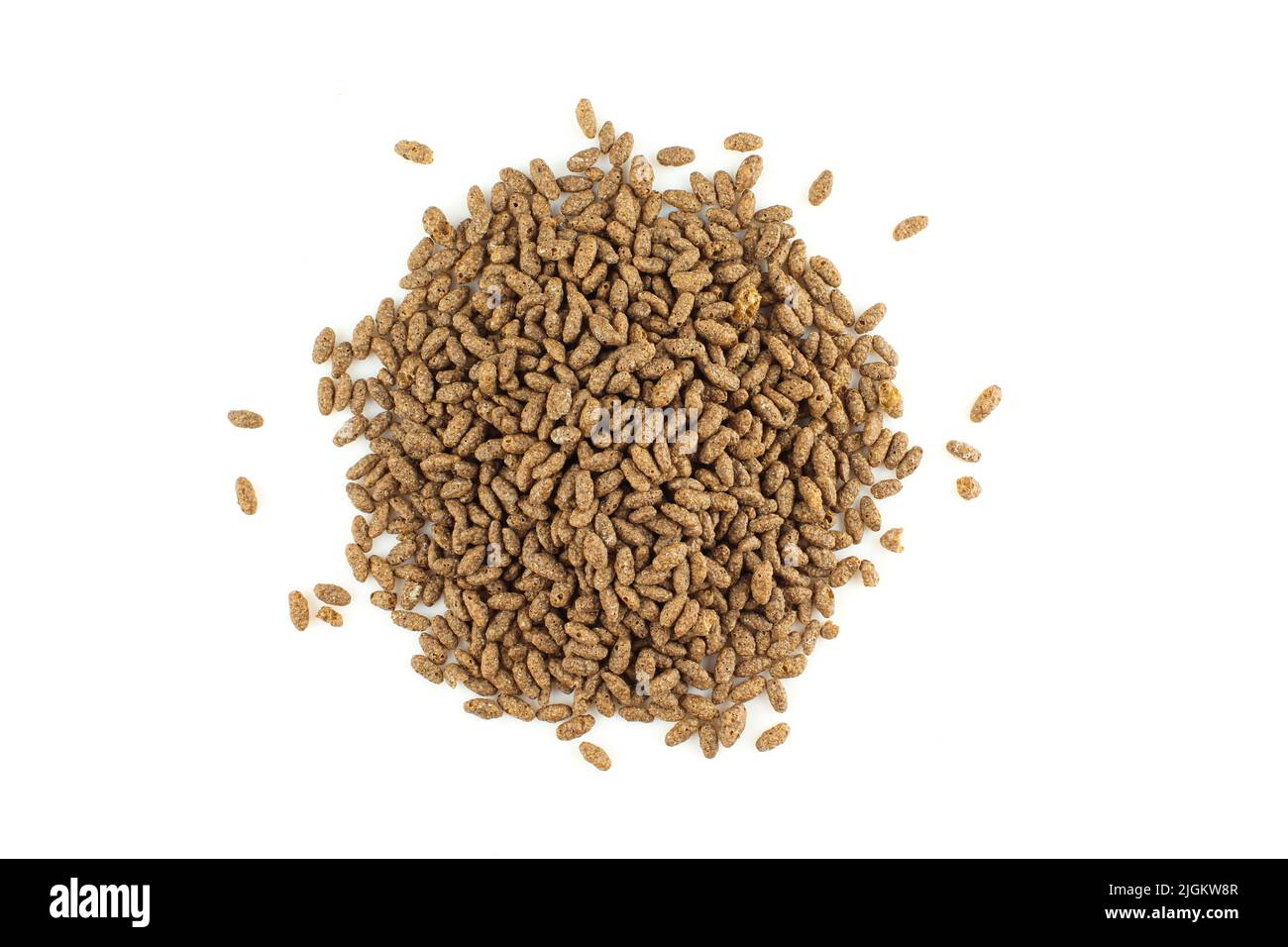 Pile of dry chocolate rice shaped flakes. Delicious cornflakes for ...