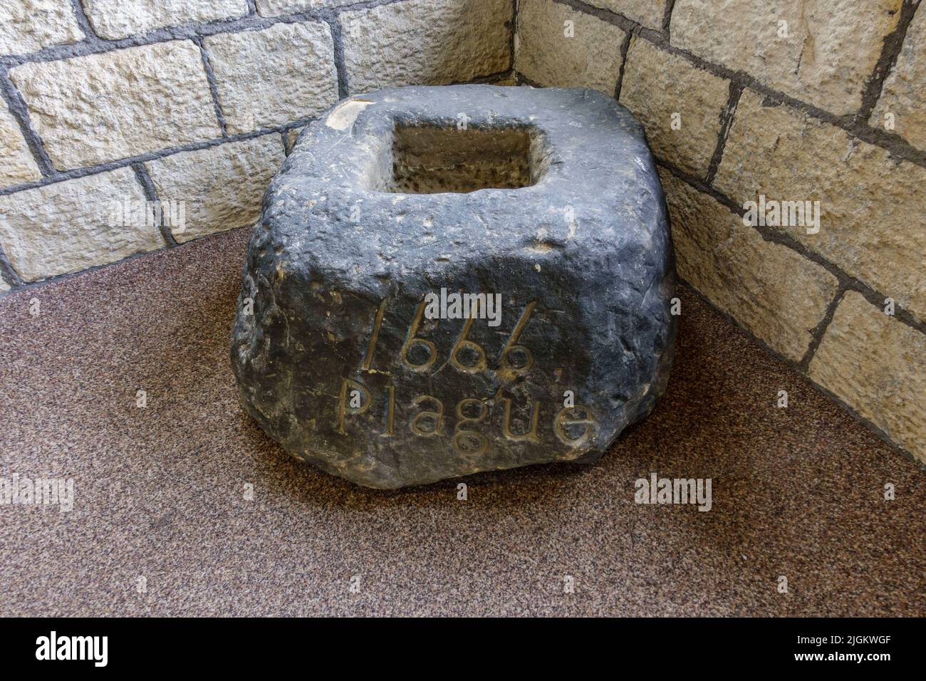 A plague stone with 1666 incribed on the side (see notes) inside the ...