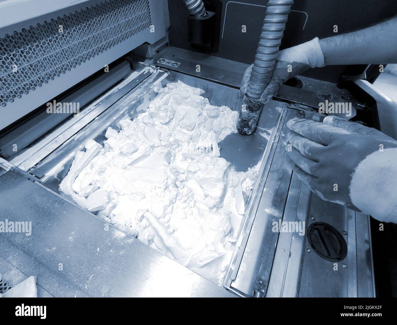 Engineer or artist designer printing 3D parts and shaping models from ...