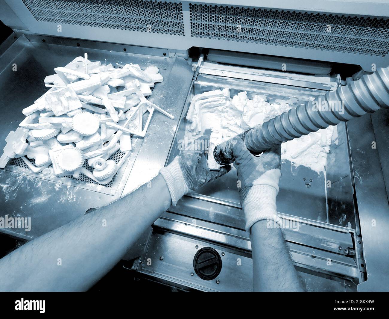 Engineer or artist designer printing 3D parts and shaping models from ...