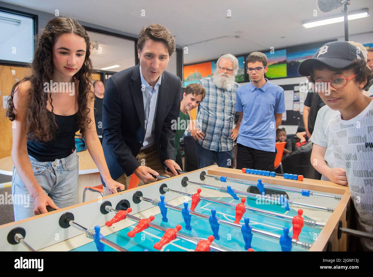 Prime Minister Justin Trudeau plays a game of foosball during a visit ...