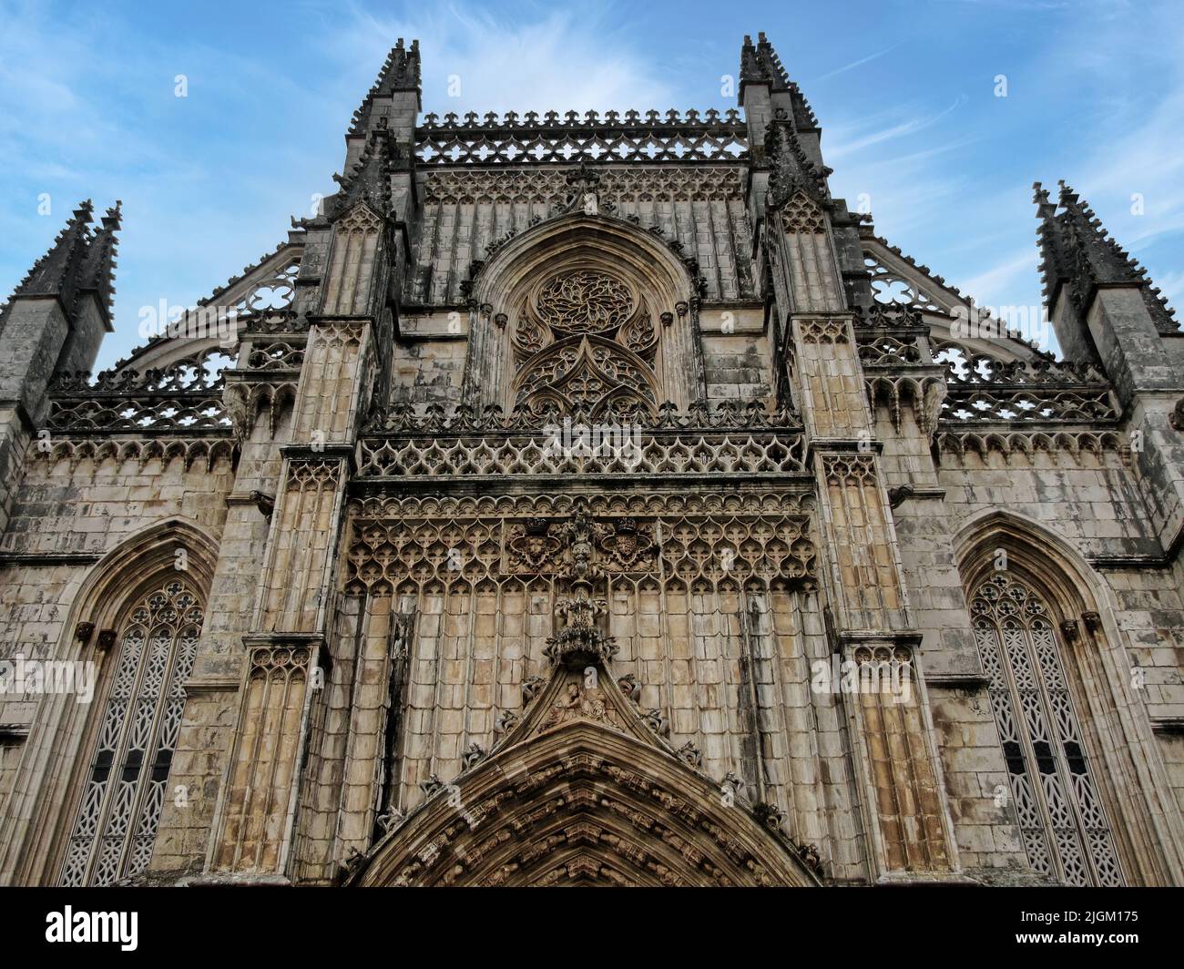 The beautiful monastery of Batalha is located in Portugal in the city ...