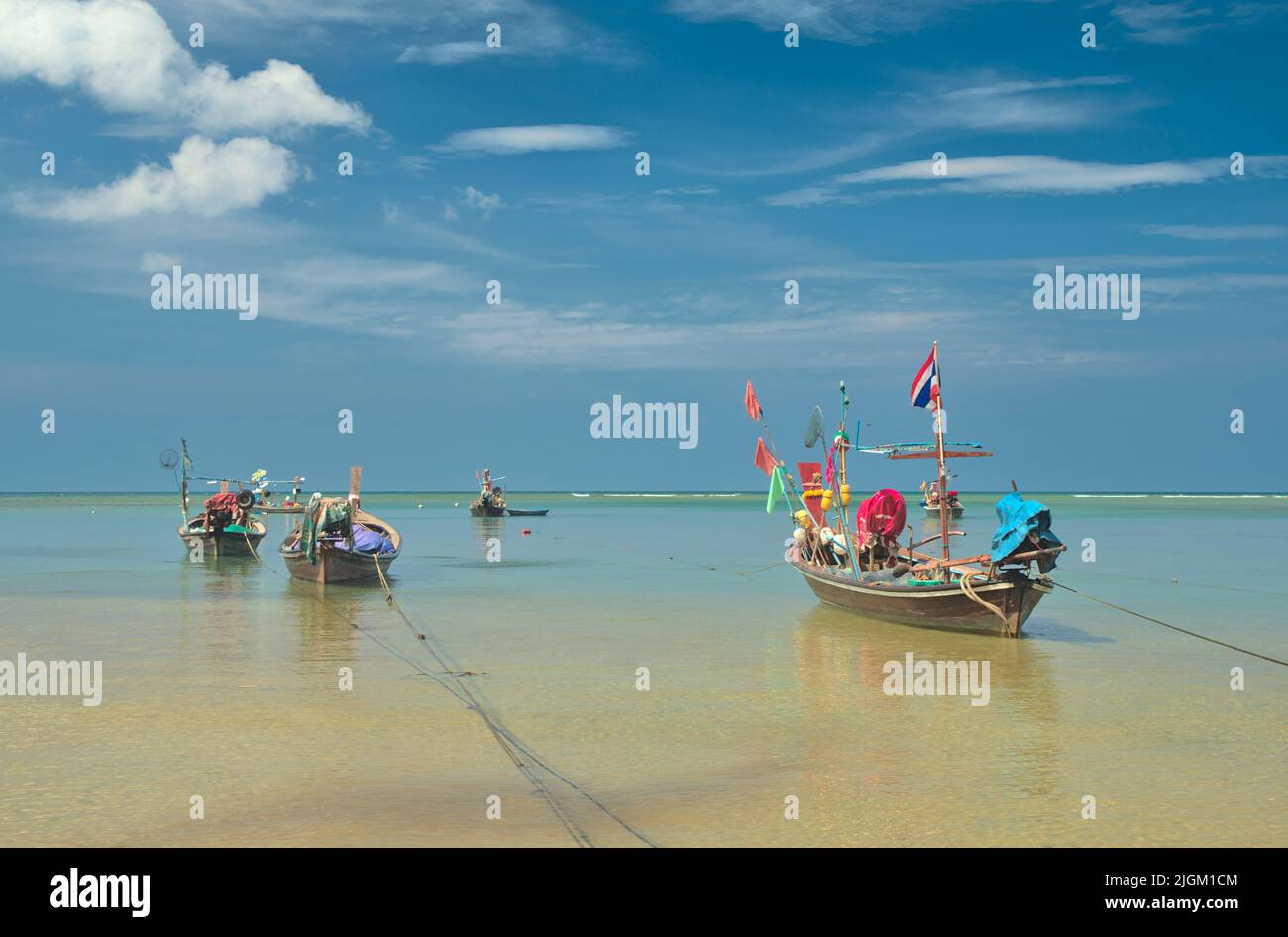 Fishing boats by the beach of the Andaman Sea - Phuket Island, Thailand Stock Photo - Alamy