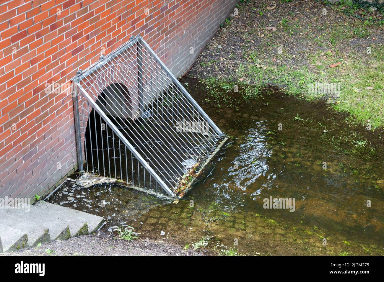 Metal grid storm drain filter barrier. Clean water city channel spring ...