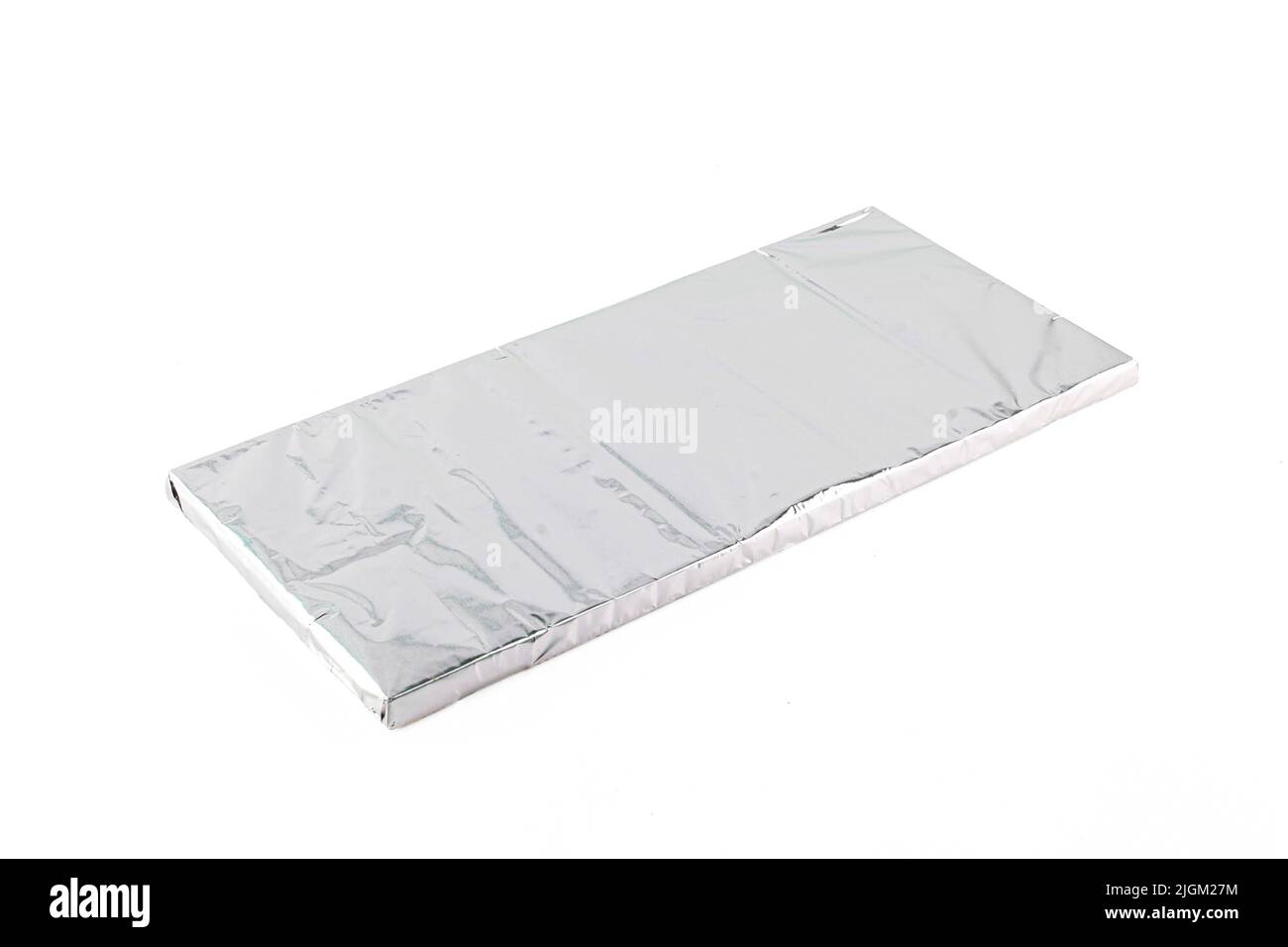 Chocolate block in silver foil isolated on white background Stock Photo ...
