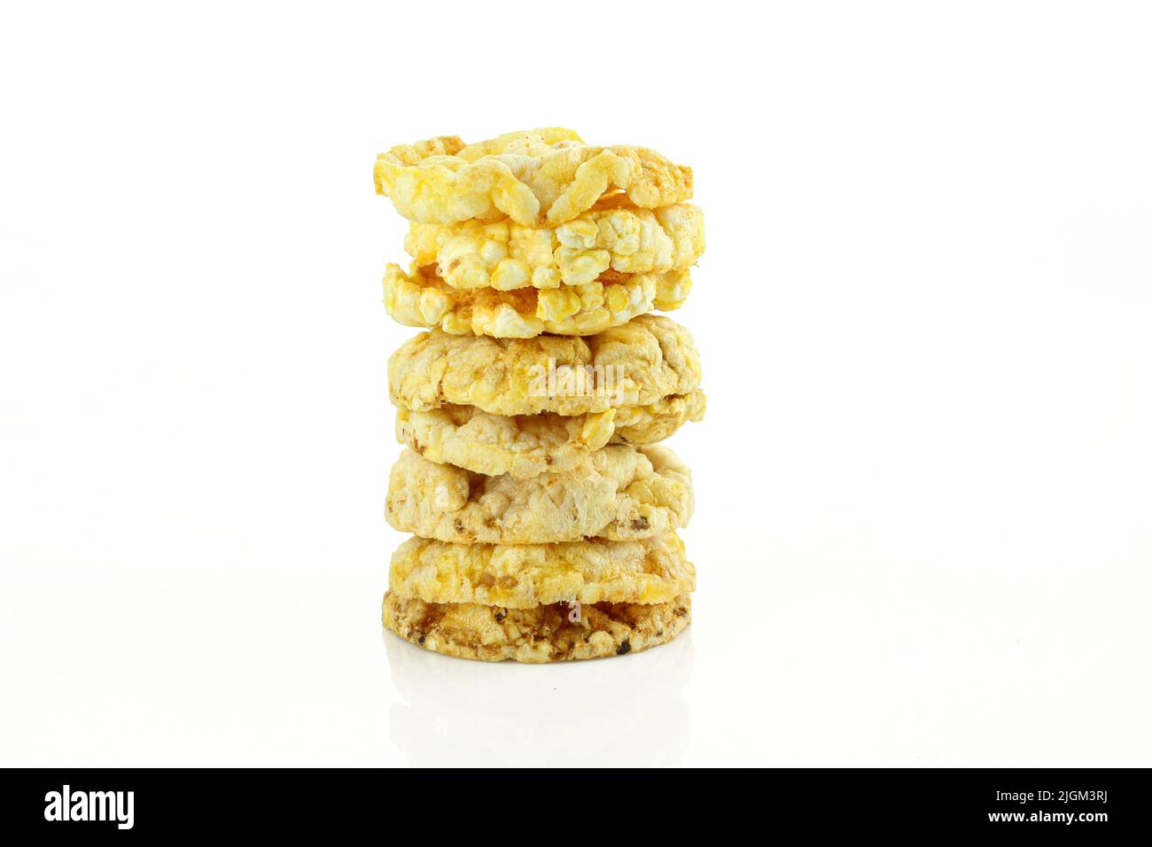 Stack of crispy and spicy flavoured corn snacks isolated on white ...