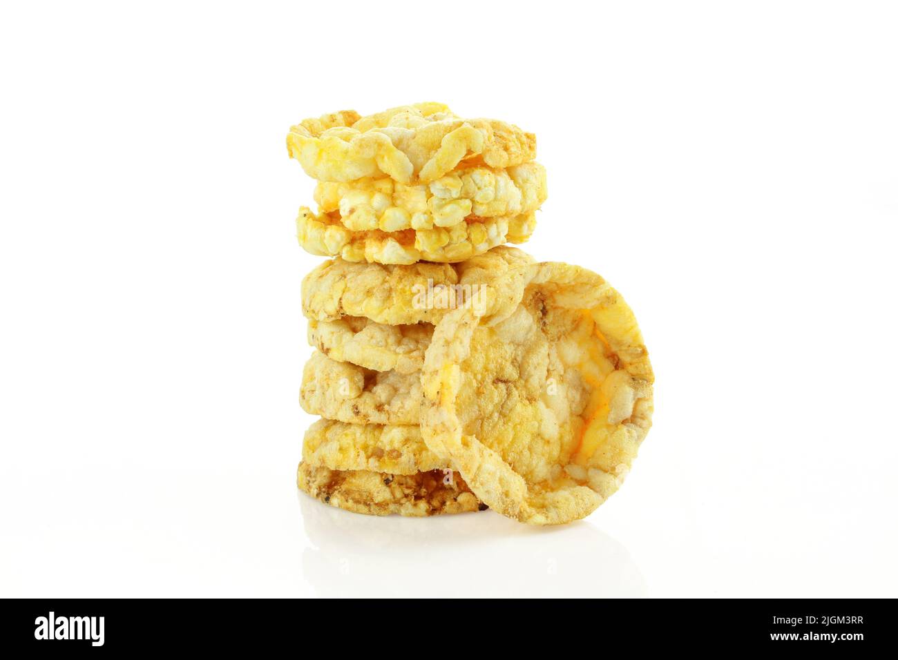 Stack of crispy and spicy flavoured corn snacks isolated on white ...