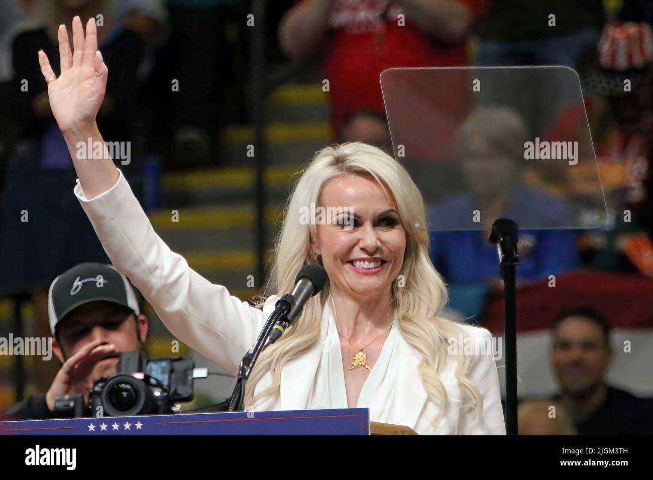 Anchorage, Alaska, USA. 9th July, 2022. Kelly Tshibaka waves to her ...