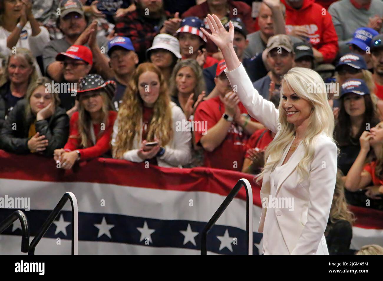 Anchorage, Alaska, USA. 9th July, 2022. Kelly Tshibaka waves to her ...