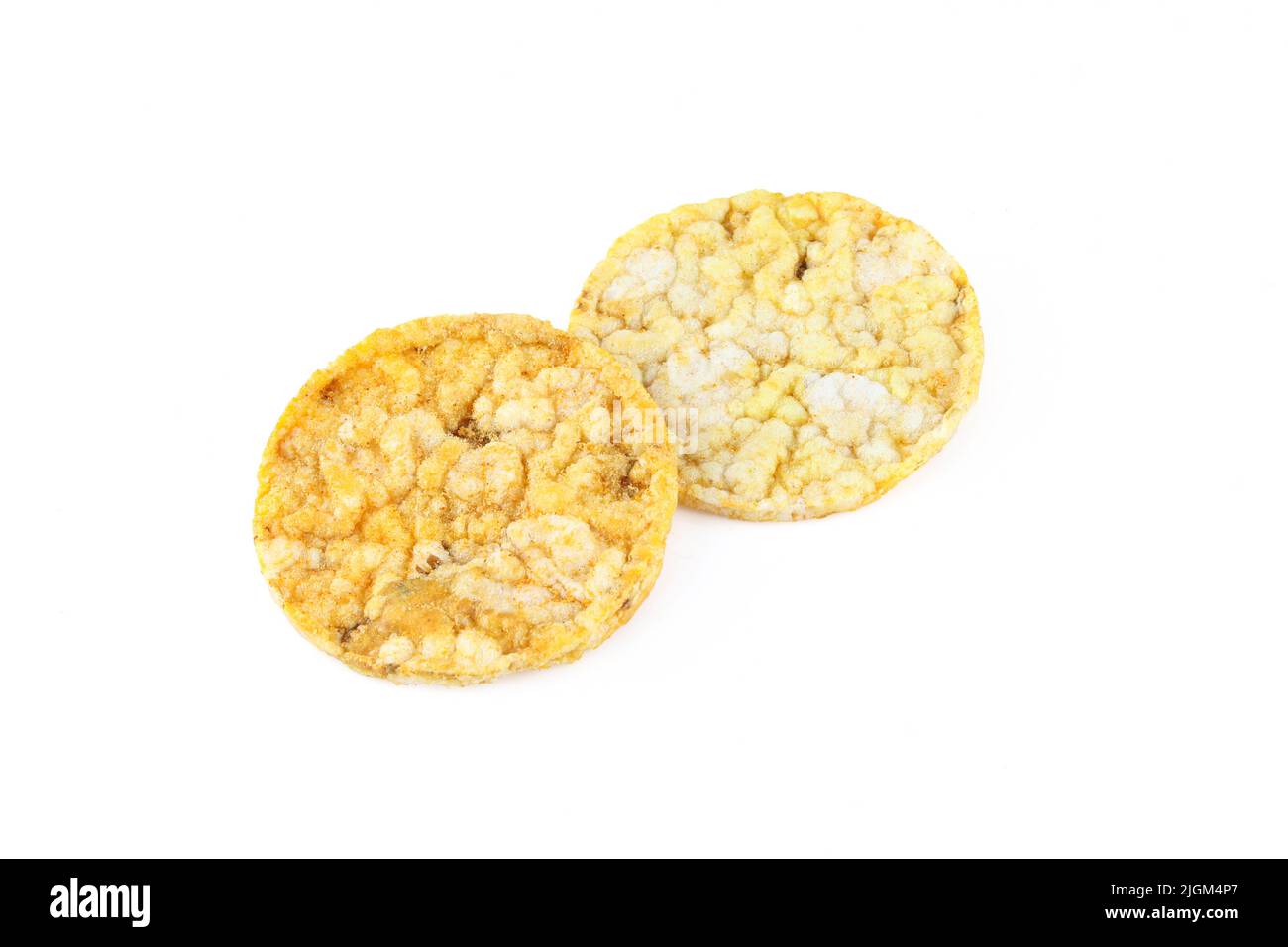Two super thin flavored corn chips isolated on white background Stock ...