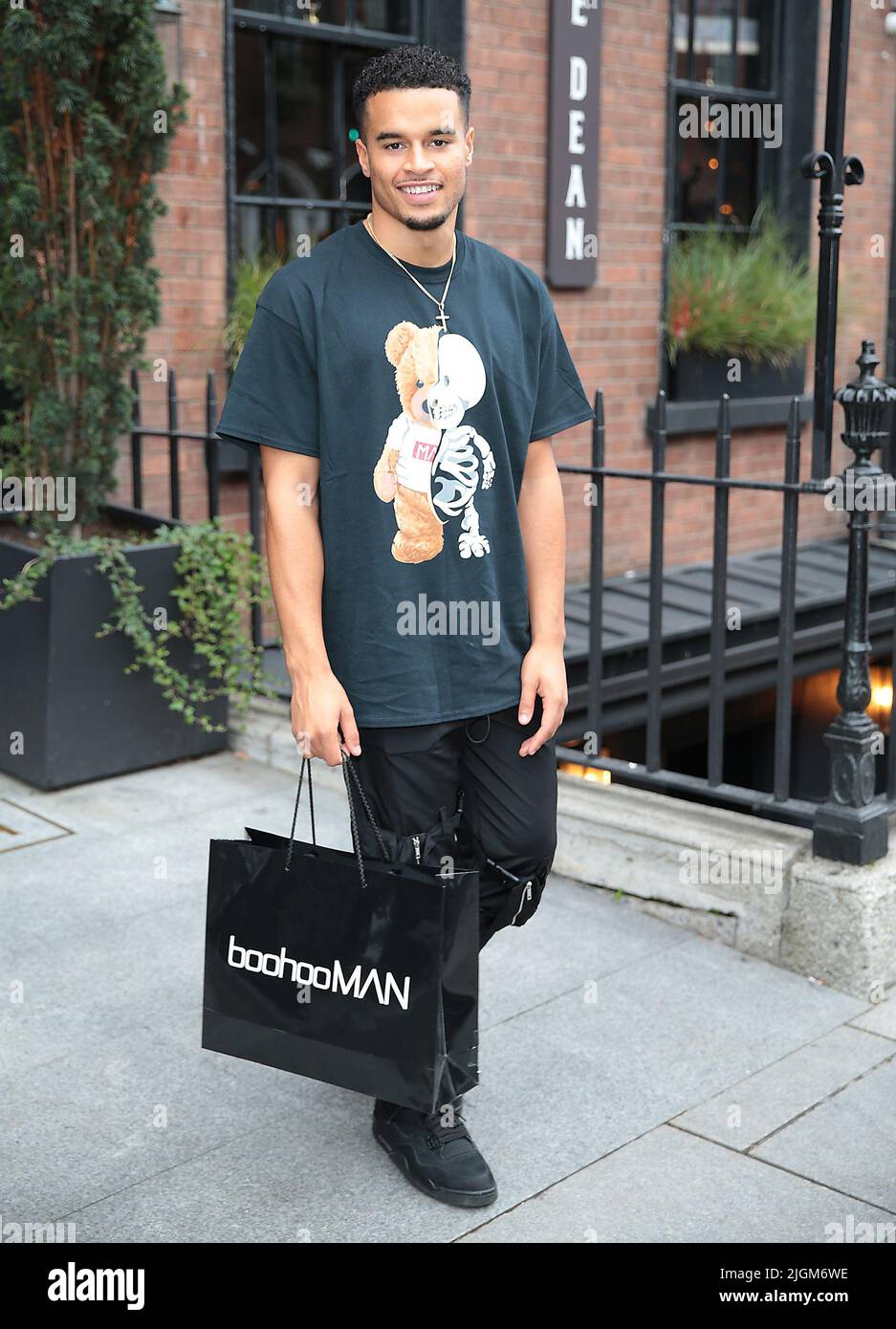 Love Island finalist and boohooMAN ambassador Toby Aromolaran pictured ...