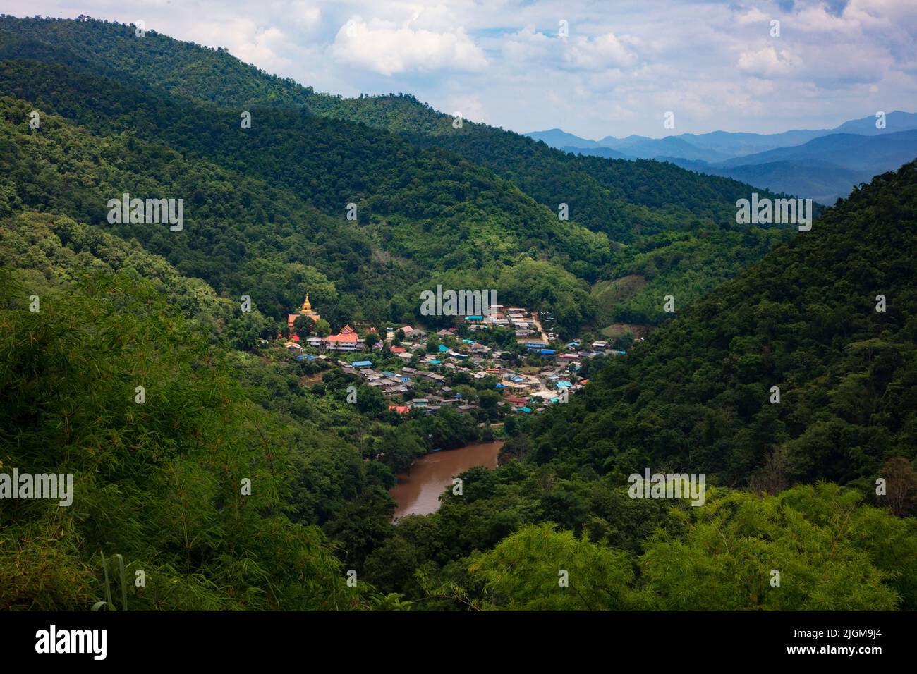 A Burmese village across the Mae Kok River near the town of Tha Thong ...