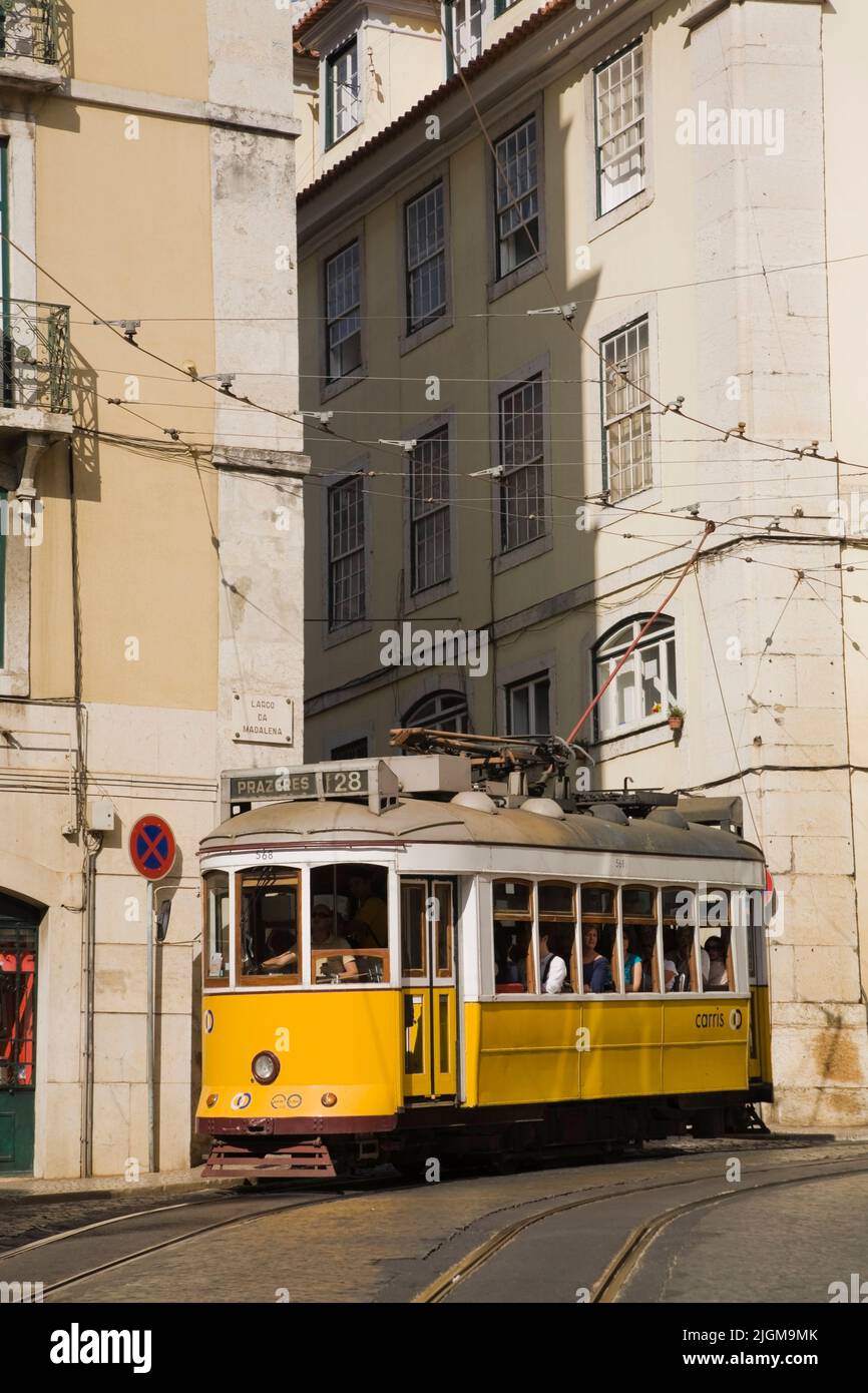 Old electric trolley car on a city street in Lisbon, Portugal, Europe ...