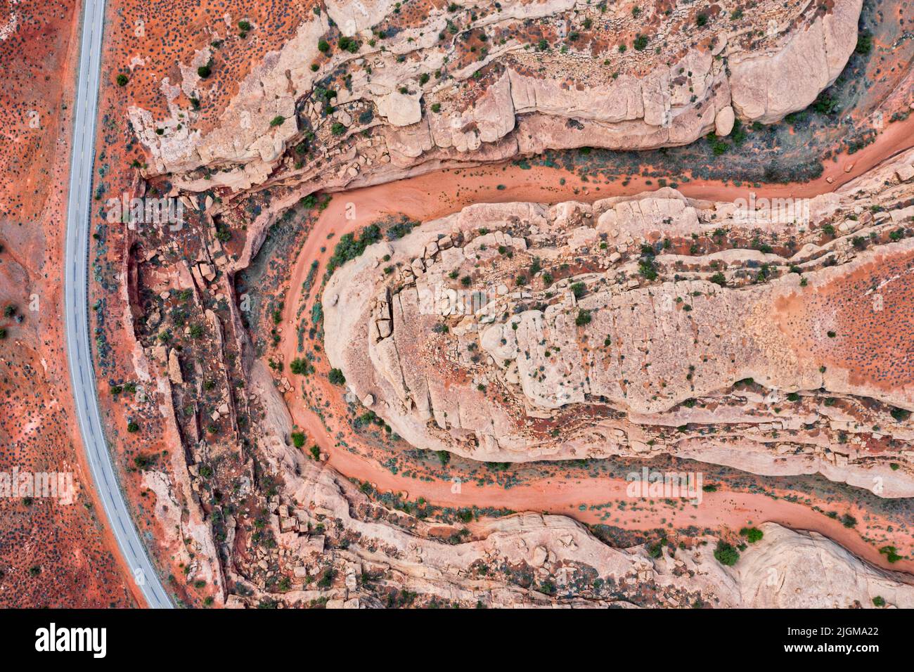 Top down drone photo of highway in Utah through red canyon and empty ...