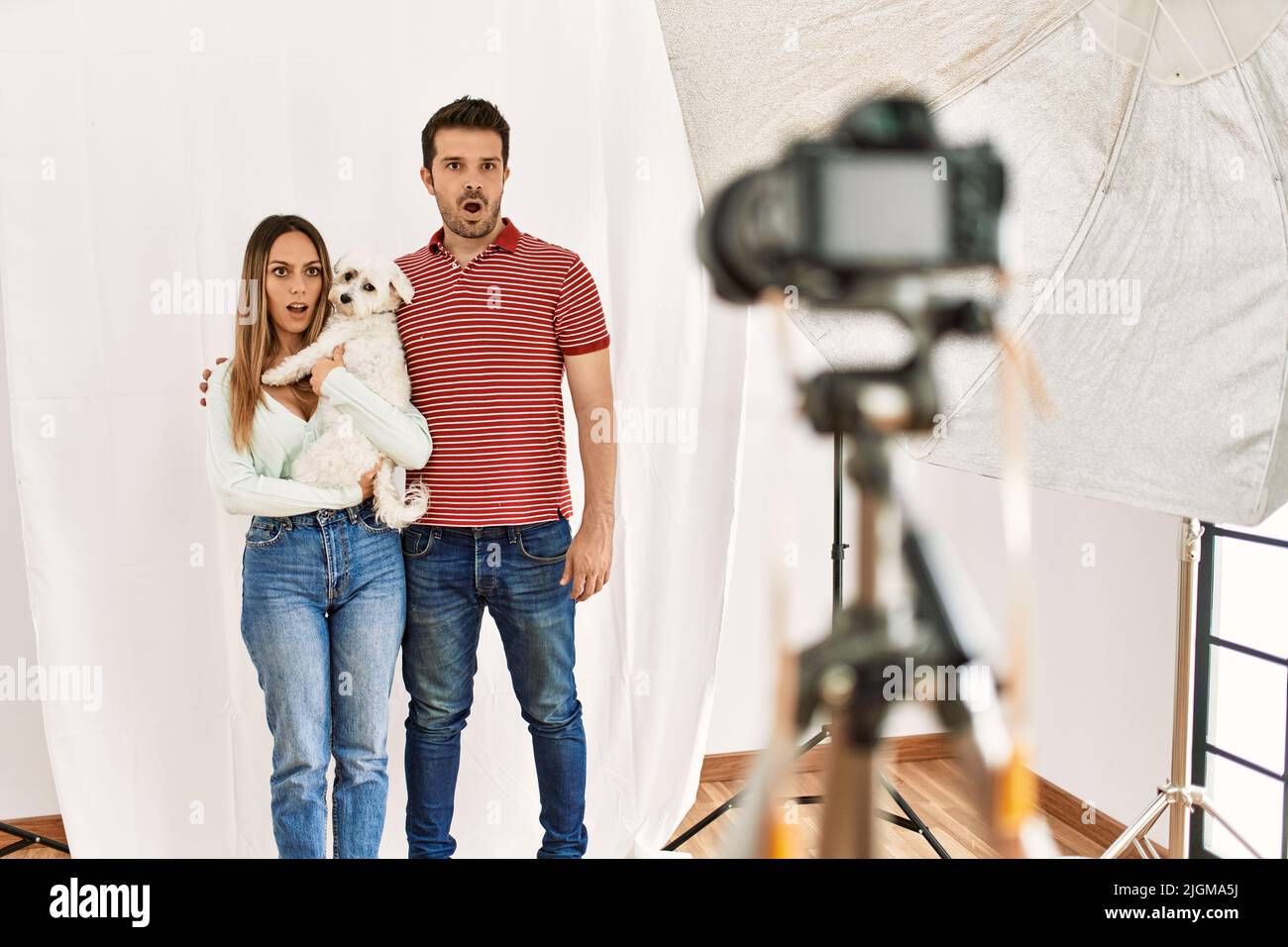 Couple of boyfriend and girlfriend with dog posing as model at ...