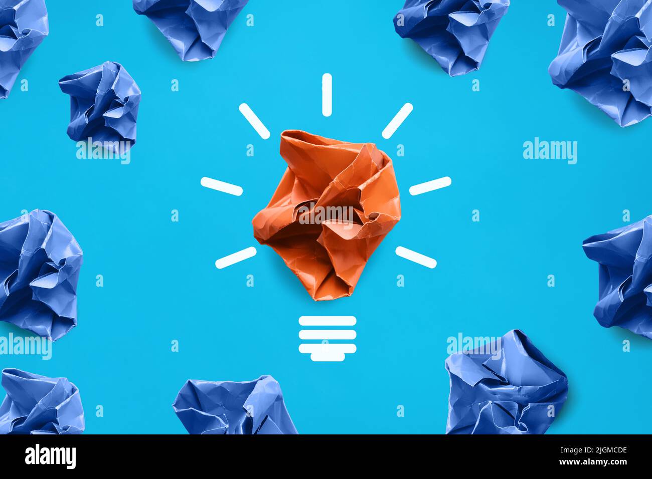 Blue colored paper balls and one orange colored crumpled paper Stock ...