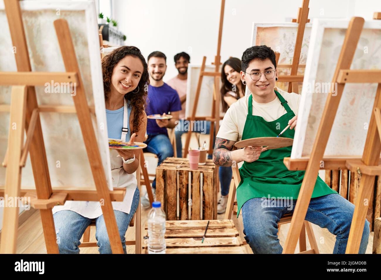Group of draw students smiling happy drawing at art studio Stock Photo ...