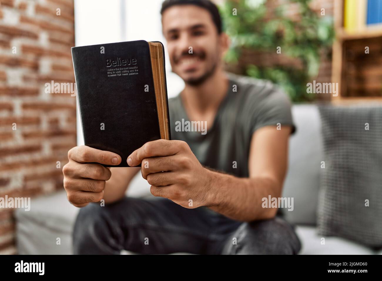 Hispanic holding bible hi-res stock photography and images - Alamy