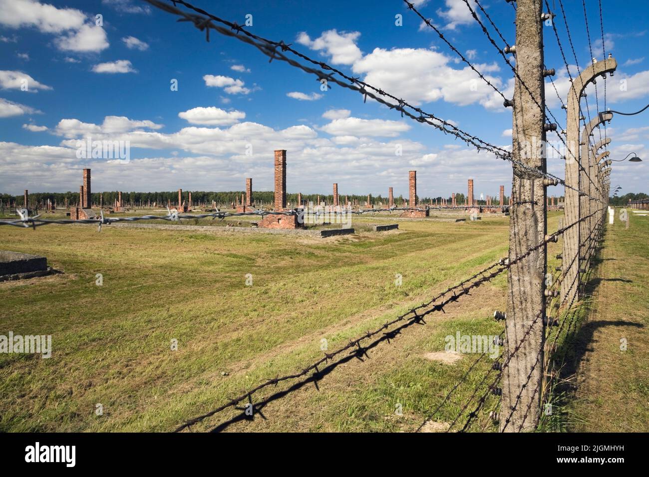 Building foundations and barbed wire electric fence inside the ...