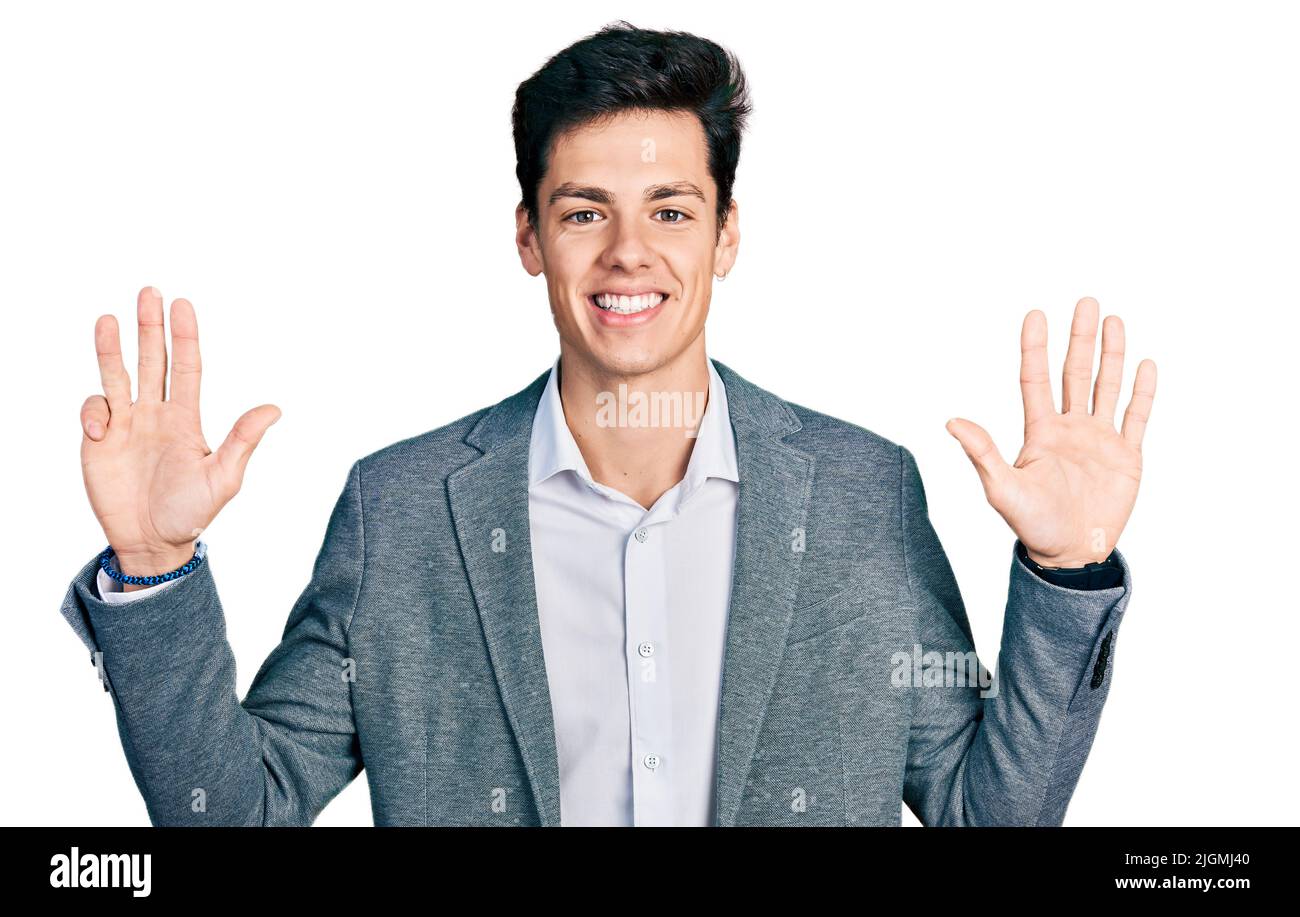 Young hispanic man wearing business clothes showing and pointing up ...